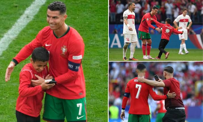 Cristiano Ronaldo posed for a photo with a young pitch invader against ...